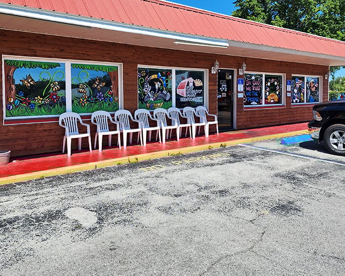 The unassuming exterior of The Biscuit Barn proves once again that the best breakfast spots often hide behind modest facades. Those colorful window paintings promise delicious things inside.