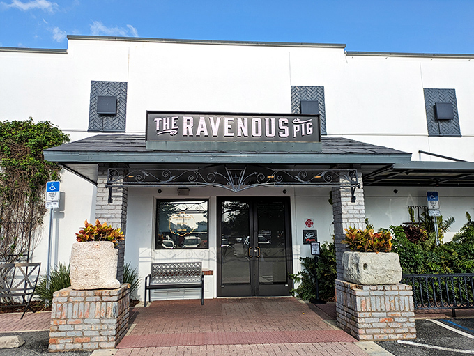 The unassuming façade of The Ravenous Pig belies the culinary wonderland within. Like finding a secret passage to flavor country in Winter Park's upscale neighborhood.