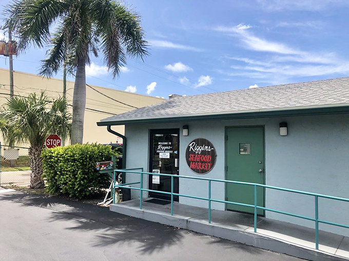 The unassuming exterior of Riggins Crabhouse hides seafood treasures within, proving that in Florida, the best spots often wear the humblest disguises.