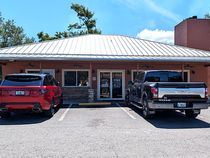 The unassuming exterior of Big John's hides Tampa's barbecue treasure – like finding a diamond in a strip mall setting.