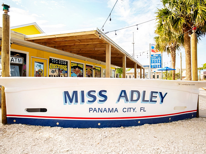 The bright yellow exterior of Hunt's with its boat hull "MISS ADLEY" out front isn't just eye-catching—it's practically shouting "fresh seafood ahead!" at passing motorists.