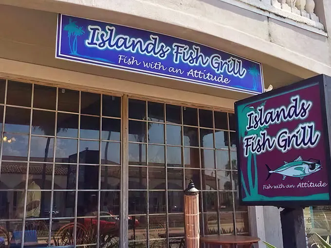The unassuming turquoise and purple storefront might not stop traffic, but locals know this modest exterior hides seafood treasures worth discovering.