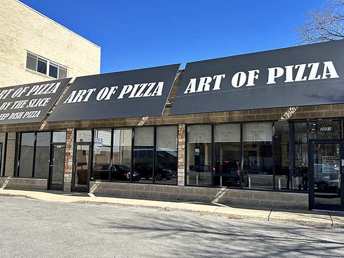The unassuming storefront on Ashland Avenue hides Chicago's pizza paradise like Clark Kent's glasses hide Superman. No cape required for this heroic meal. 