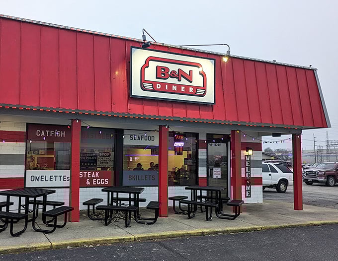 The bright red exterior of B&N Diner stands like a beacon of breakfast hope on a gray Indiana morning. Classic diner perfection awaits inside.