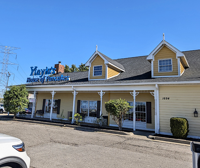 The cheerful yellow exterior of Yiayia's beckons like a breakfast lighthouse guiding hungry souls to pancake paradise.