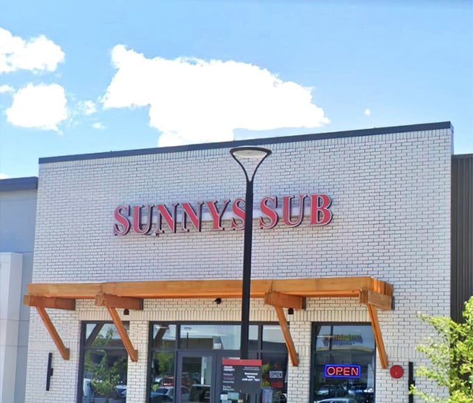 The unassuming white brick facade of Sunny's Sub belies the culinary treasures within. Sometimes the best food hides behind the simplest storefronts.