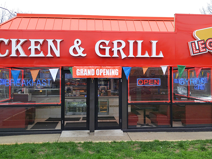 The bright red awning of Legends Chicken & Grill stands out like a culinary lighthouse, beckoning hungry travelers with promises of crispy delights within.