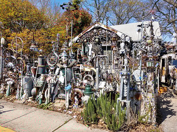 The front yard fortress of fantastical metal—where your neighbor's "junk" becomes a suburban Guggenheim that would make Tim Burton jealous.