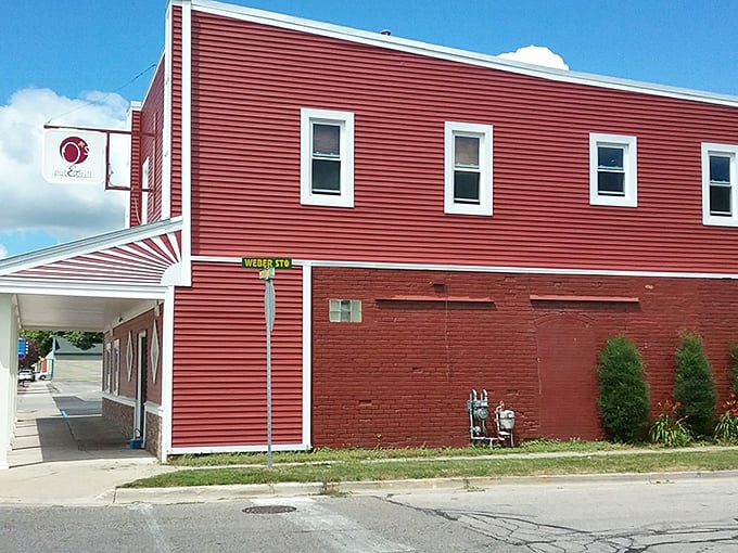 That bright red building isn't trying to hide – it's proudly announcing "something delicious happens here!" Like a culinary lighthouse guiding hungry travelers home.