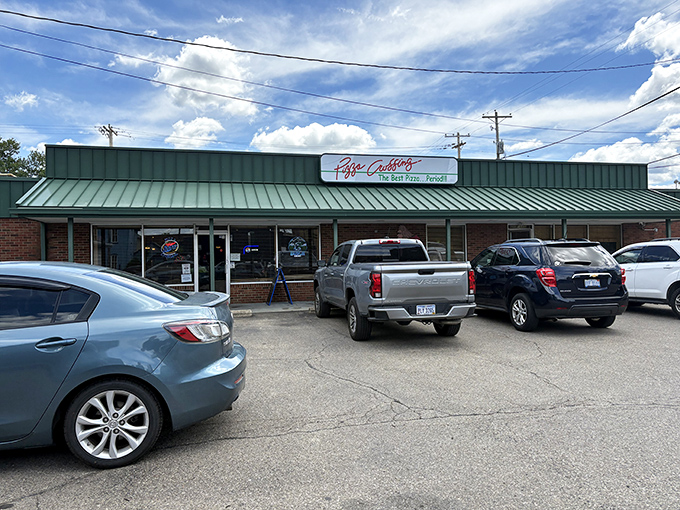 Pizza Crossing's modest exterior hides culinary treasures within, like a delicious secret waiting to be discovered in Logan's rolling hills.