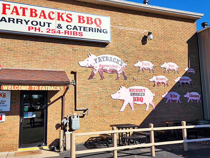 The barbecue beacon of Dayton! Fatback's brick exterior with its parade of pig cutouts promises a smoky pilgrimage worth every mile of your journey.