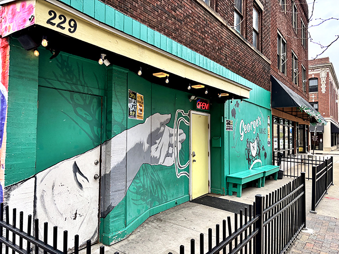 The mural-adorned exterior of George's Lounge boldly proclaims "Where BURGERS Are ART" – a promise they deliver on with mouthwatering precision.