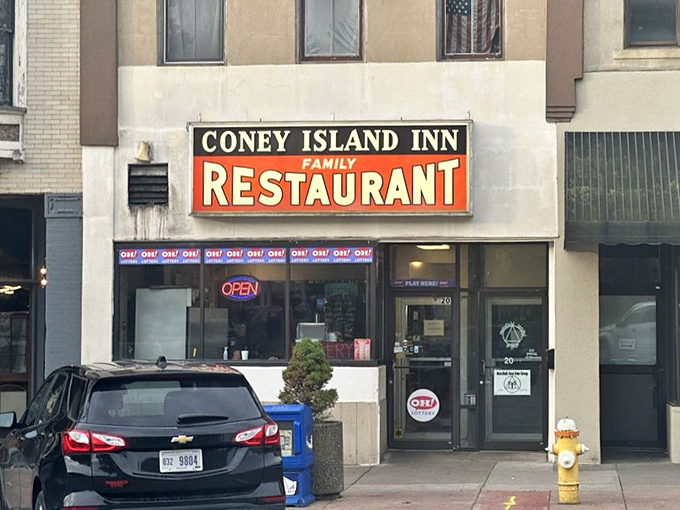 The unassuming storefront of Coney Island Inn beckons with its vintage sign – proof that culinary treasures often hide in plain sight.
