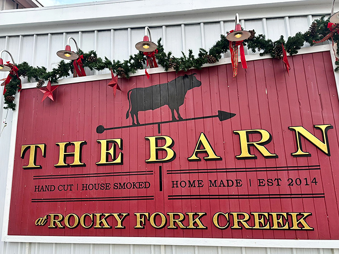 The rustic charm of this barn-turned-steakhouse is no accident—it's architectural theater setting the stage for culinary drama within.