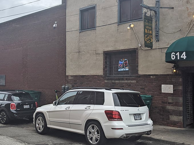 The unassuming entrance to burger paradise. Johnny's Little Bar hides behind this modest door, proving great food doesn't need flashy signage to be legendary. 