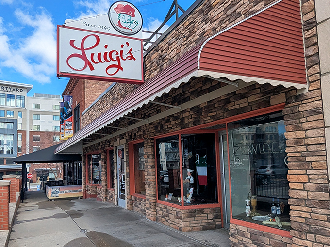 Luigi's iconic storefront stands like a time capsule on Akron's South Main Street, its vintage sign promising Italian comfort that generations have trusted.