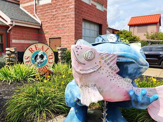 Storm clouds gather dramatically over The Real Seafood Co., as if nature itself is anticipating the flavor tsunami waiting inside.