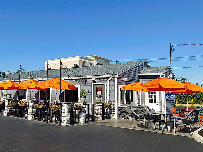 The unassuming gray exterior with vibrant orange umbrellas is like Cincinnati's version of a culinary mullet—business on the outside, party on the inside.