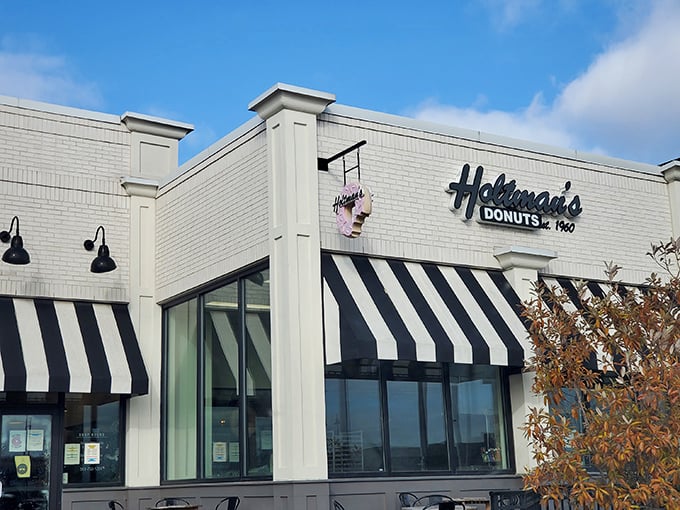 The classic white brick façade with black and white awnings isn't just a building—it's a beacon of hope for the donut-deprived masses of Ohio.
