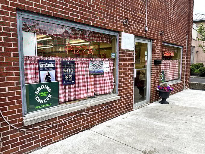 This brick building isn't just eye-catching—it's a beacon for pizza pilgrims who've been making the journey to this Bexley landmark for generations.
