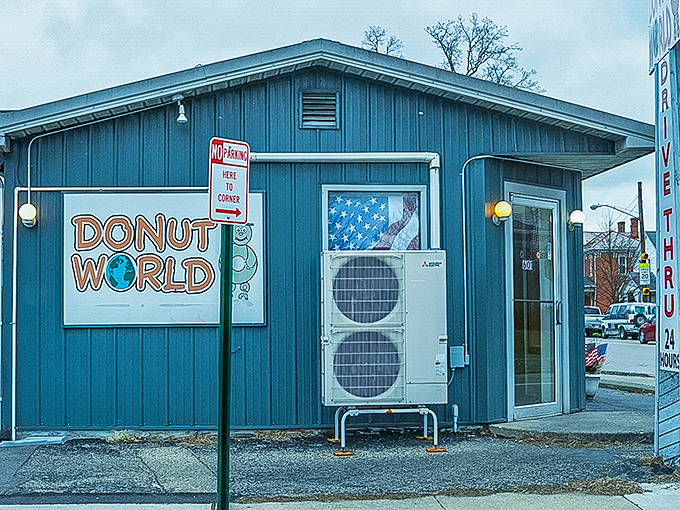 The unassuming exterior of Donut World stands like a humble superhero's secret lair, quietly saving Lancaster from boring breakfasts one donut at a time.