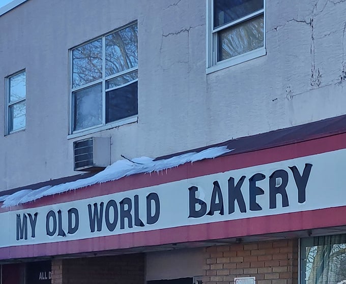 The unassuming storefront of My Old World Bakery stands as a testament to the adage that books shouldn't be judged by their covers—especially when those covers contain donuts.