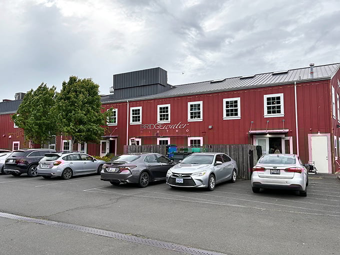 The bright red exterior of Bridgewater Bistro stands out like a cheerful lighthouse, beckoning hungry travelers to dock for dinner in Astoria.