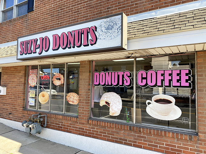 The pink sign beckons like a lighthouse for the sugar-deprived. Suzy-Jo's storefront promises simple pleasures in a world of complicated everything.