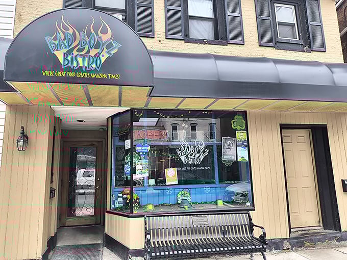 The unassuming exterior of Bad Boyz Bistro in Bedford hides culinary treasures within. That flame-adorned sign isn't just for show—it's a warning for your taste buds.