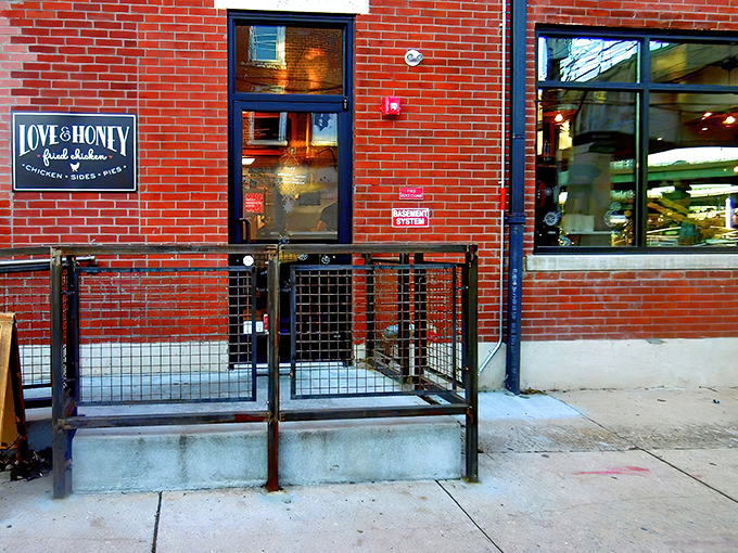 The unassuming brick facade of Love & Honey Fried Chicken hides culinary treasures within. Philadelphia's best-kept secret won't stay hidden for long.