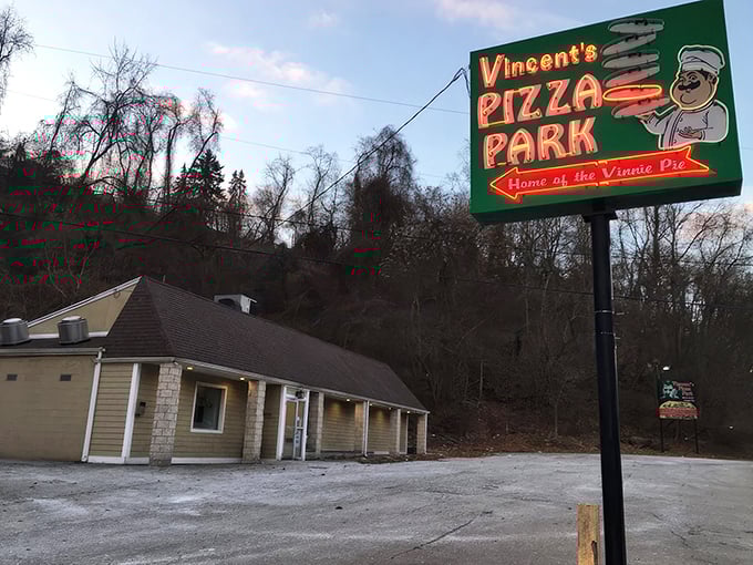 The iconic neon sign beckons pizza pilgrims like a lighthouse for the hungry. Vincent's Pizza Park isn't just a restaurant—it's a Pittsburgh institution.