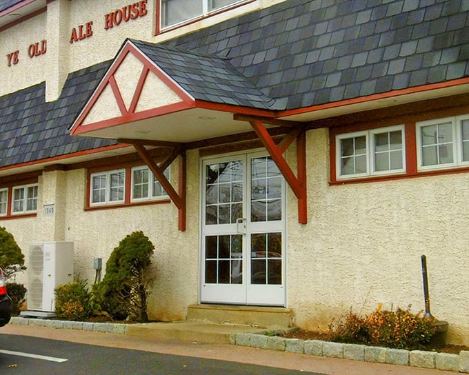 The unassuming exterior of Ye Olde Ale House stands like a culinary speakeasy—no flashy signs needed when your roast beef sandwich has its own fan club.