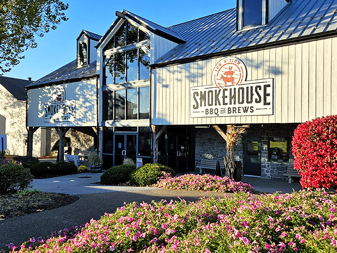 The cream-colored exterior with its striking blue metal roof stands like a barbecue beacon in Amish country, promising smoky delights within.