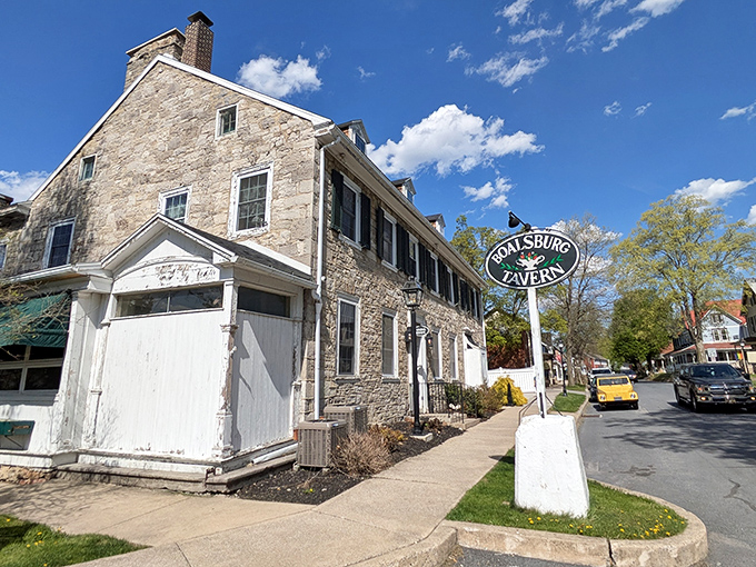 The historic limestone façade of Duffy's Tavern stands proudly in Boalsburg, a timeless sentinel of hospitality that's witnessed centuries of Pennsylvania stories unfold.