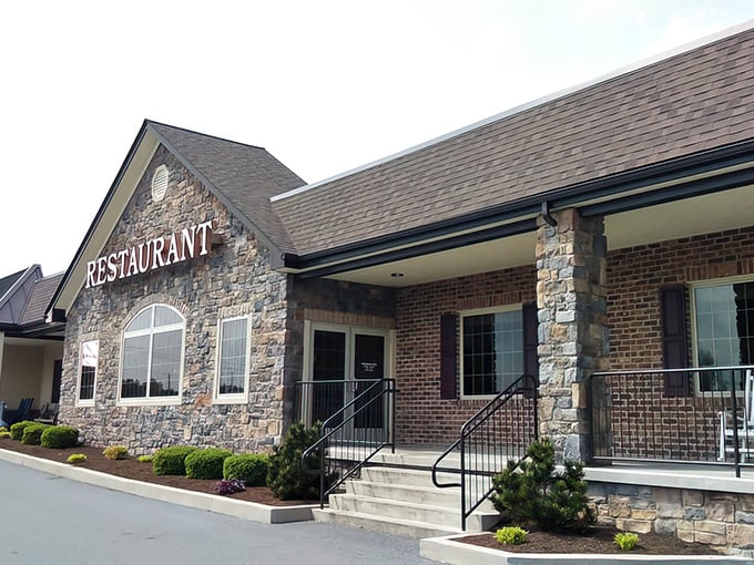 The stone facade of Dutch-Way welcomes hungry travelers like a culinary lighthouse guiding you to comfort food harbor.