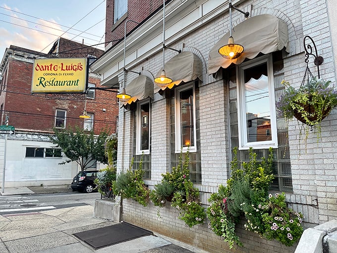 The classic white brick façade and yellow "Dante & Luigi's" sign have welcomed hungry Philadelphians for generations, promising Italian comfort within.