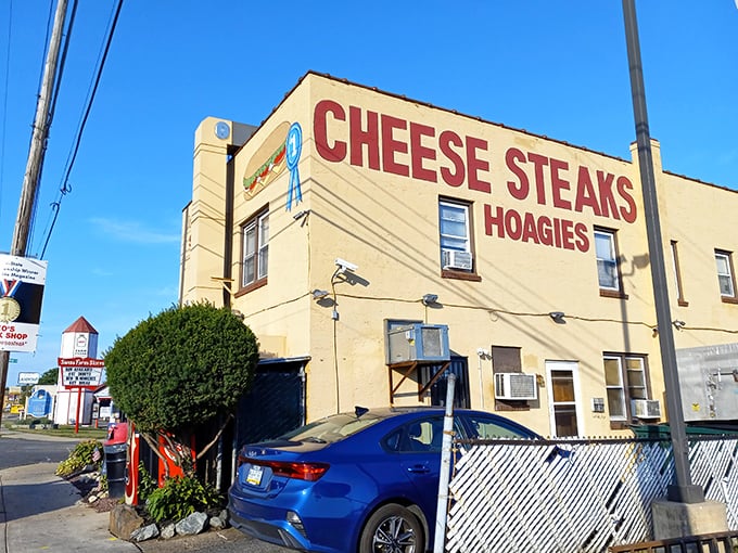 The yellow beacon of sandwich salvation on Chester Pike. Bold red letters promise cheesesteaks and hoagies – a siren call to hungry Pennsylvanians.