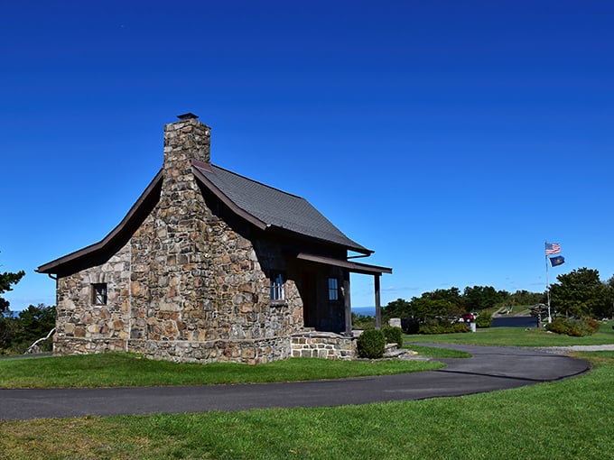 This rustic stone cabin isn't playing mountain dress-up—it's the real deal, standing sentinel at the summit with Pennsylvania's endless horizon as its daily view.