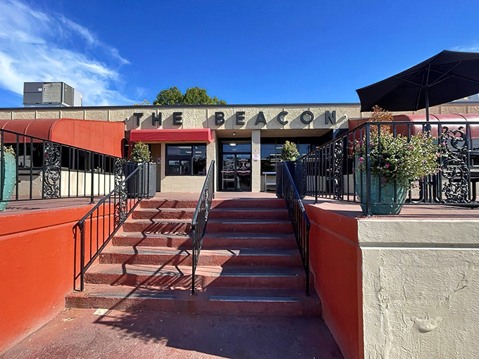 The iconic red steps leading to The Beacon aren't just an entrance—they're a gateway to burger paradise that's been welcoming hungry South Carolinians for generations.