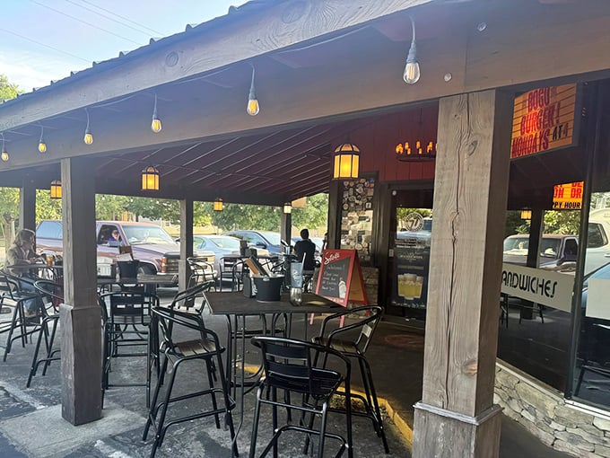 The bright red exterior of Burger Tavern 77 stands out like a beacon for burger enthusiasts, promising gourmet comfort in Columbia's Devine Street district.