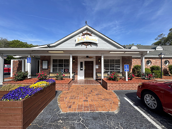 The welcoming facade of Judy Boone's, where vibrant flower boxes greet you before the aroma of Southern cooking does. Worth the drive from anywhere in South Carolina.