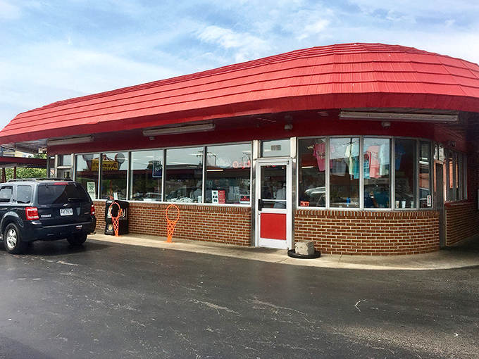 The iconic red-roofed exterior of Doumar's stands like a beacon of hope for hungry travelers—a Norfolk landmark that's seen more first dates than a high school guidance counselor.