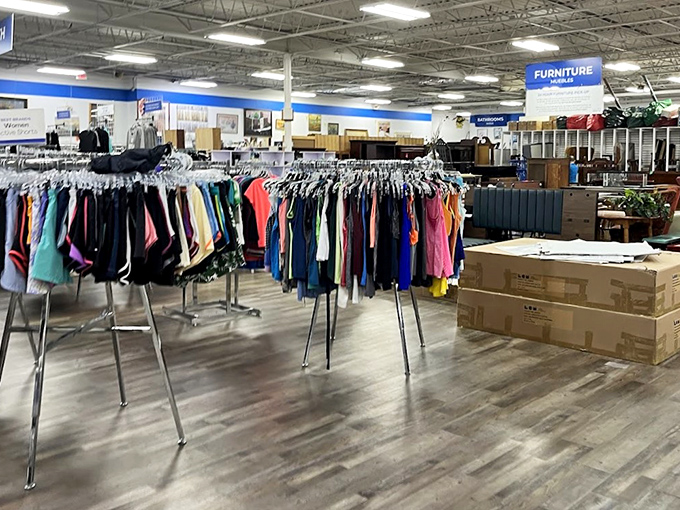ThriftSmart's expansive layout feels like a treasure map waiting to be explored. Blue signs overhead guide your adventure through this bargain wonderland.