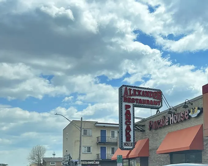 Those iconic orange awnings aren't just eye-catching—they're beacons of breakfast bliss calling to hungry souls across Stickney like a pancake lighthouse.