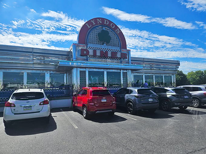 The gleaming chrome exterior of Lyndon Diner shines like a beacon of hope for hungry travelers—a time capsule of Americana serving up comfort on a plate.