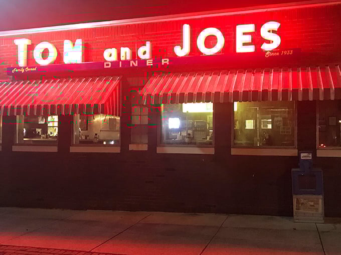 The neon glow of Tom & Joe's at night isn't just a sign—it's a beacon of breakfast hope for hungry travelers on Pennsylvania's backroads.