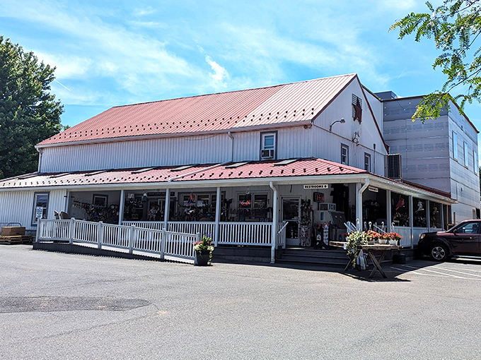 The classic white clapboard exterior with its rustic red roof and barn star isn't just Amish country architecture—it's a beacon for carb-seeking pilgrims everywhere.
