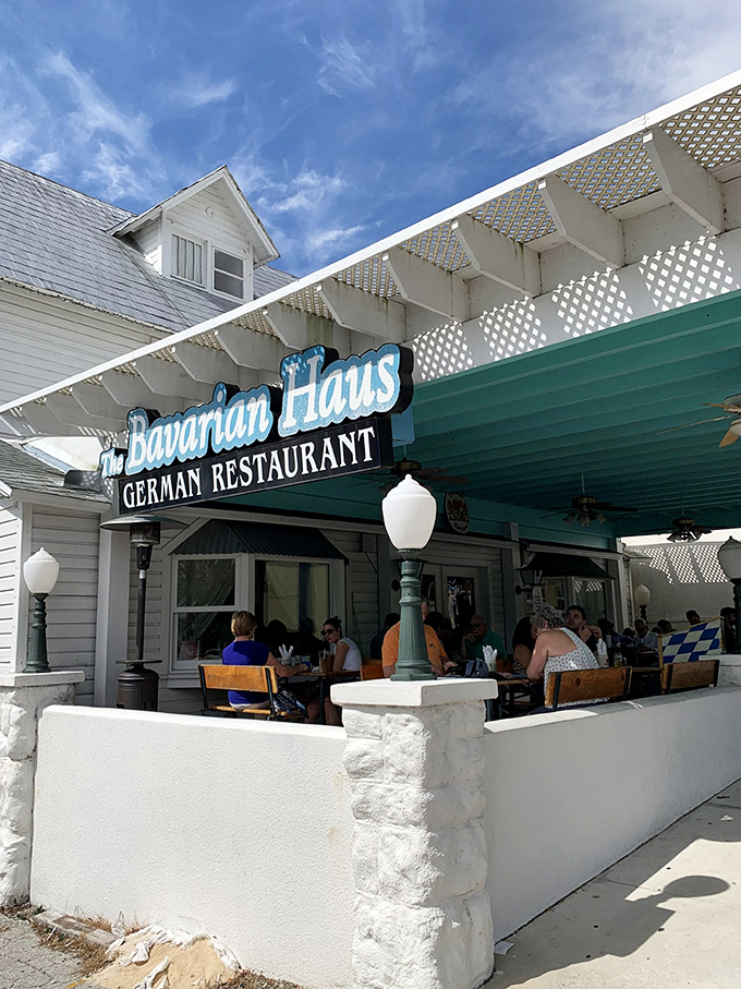 The charming facade of Bavarian Haus welcomes you with its distinctive blue and white signage—a little slice of Munich hiding in plain sight in Mount Dora.