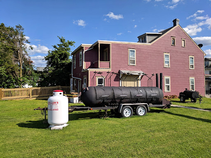 The unassuming red brick building houses barbecue magic that would make even the most dedicated meat pilgrim weep with joy.