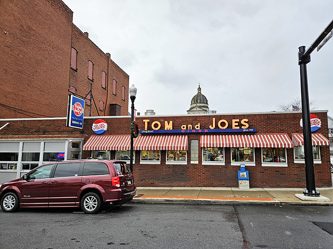The neon glow of Tom & Joe's at night isn't just a sign—it's a beacon of breakfast hope for hungry travelers on Pennsylvania's backroads.